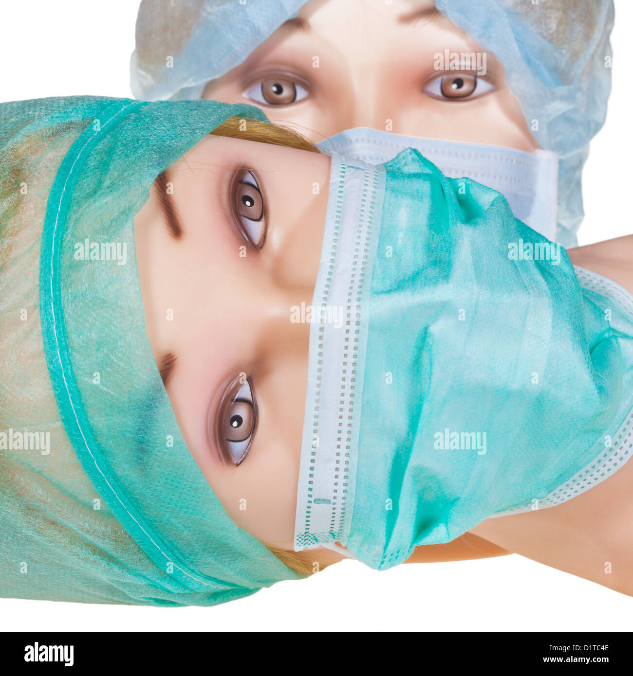 two female dummy doctor heads wearing textile surgical cap and medical ...