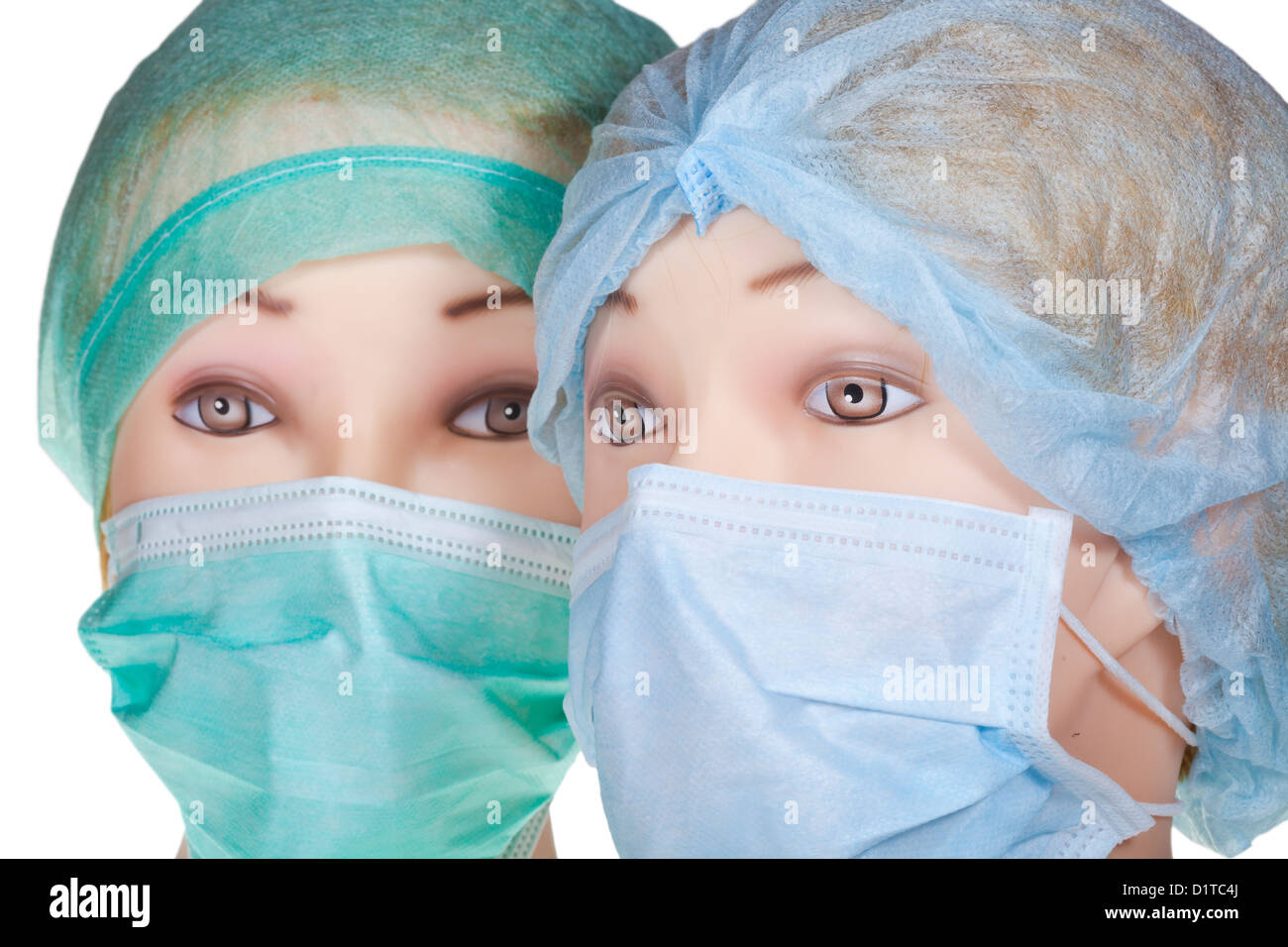 two female dummy doctor heads wearing textile surgical cap and medical ...