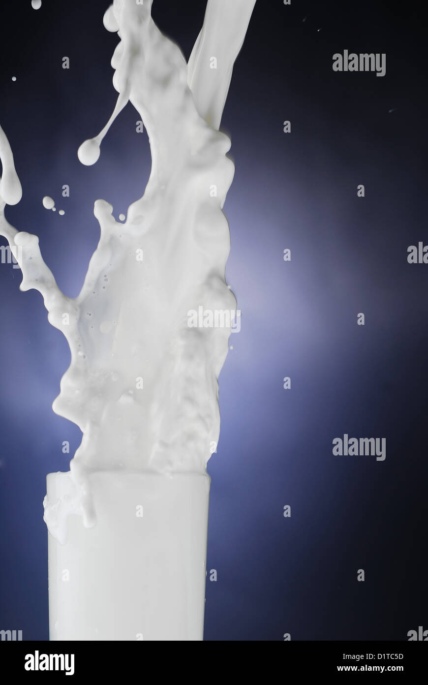 Overflowing glass milk hi-res stock photography and images - Alamy