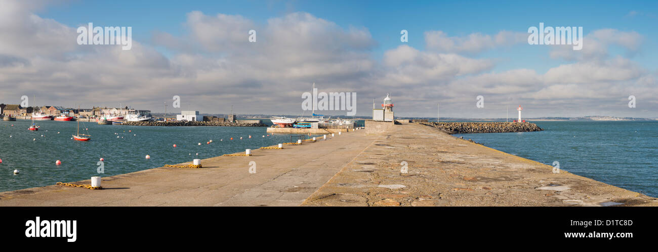 The pier and harbour entrance at the fishing town of Howth, Dublin ...