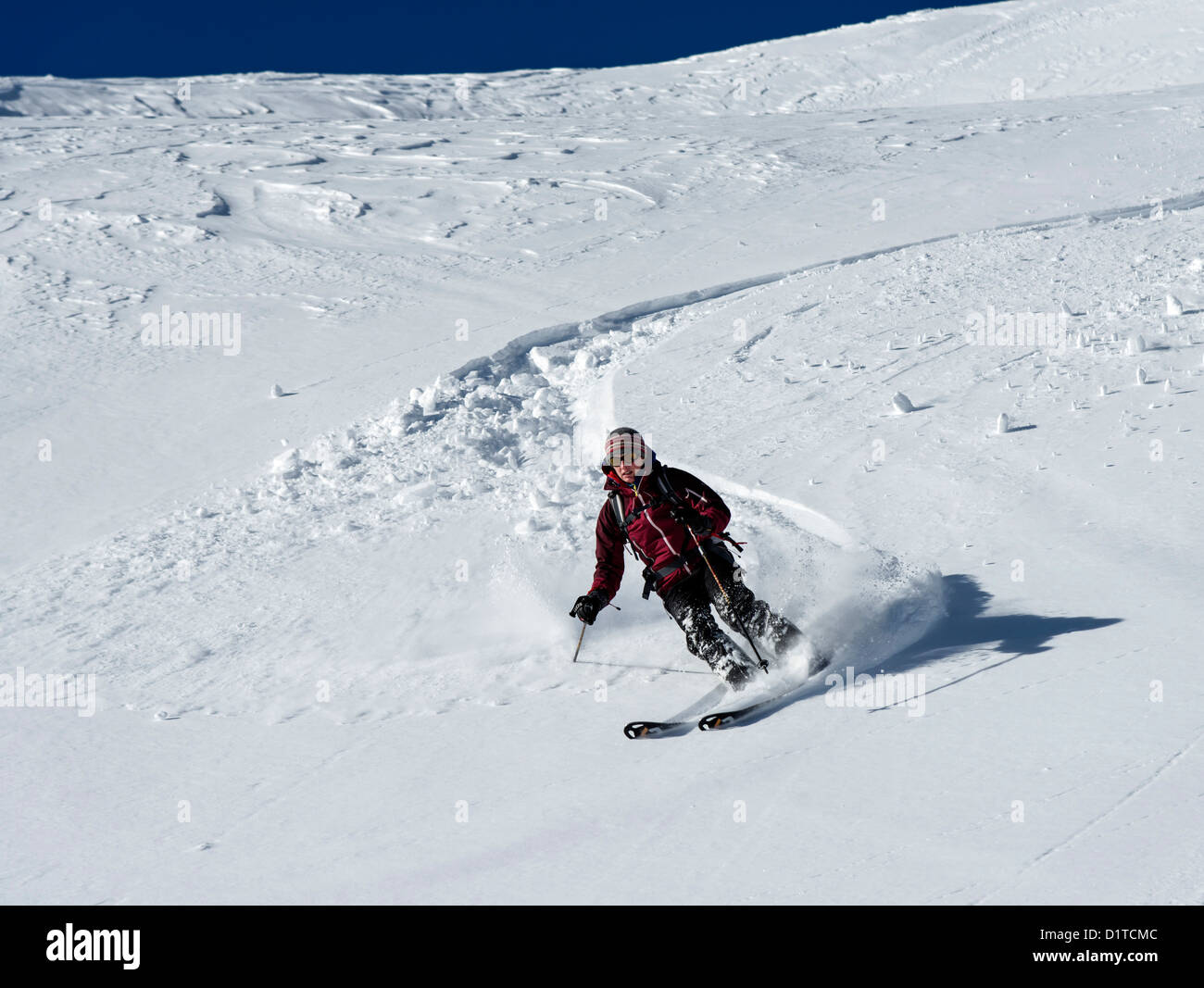Big arching turns off piste hi-res stock photography and images - Alamy