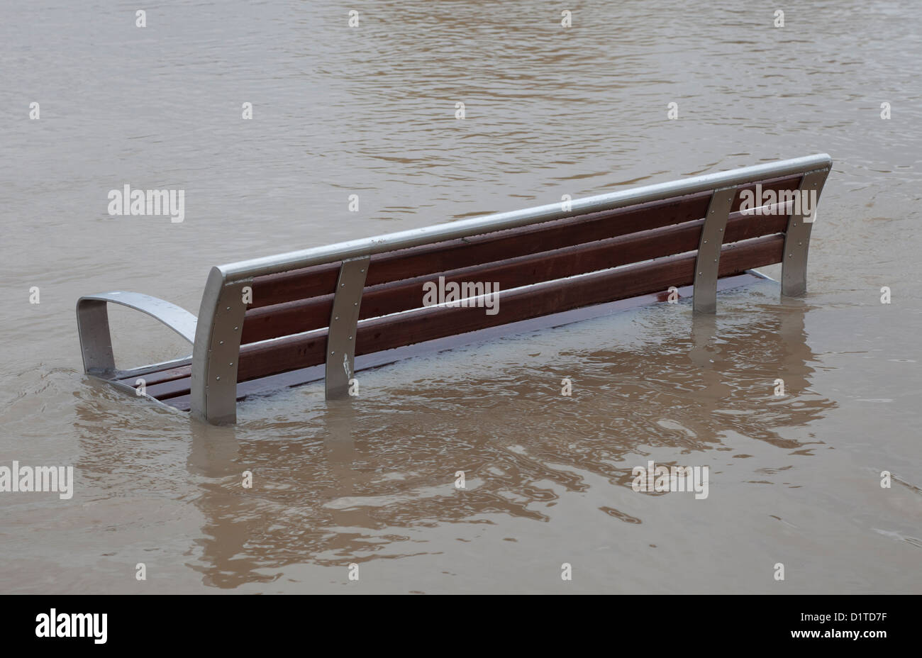 A flooded bench on the banks of the River Avon, Stratford upon Avon ...