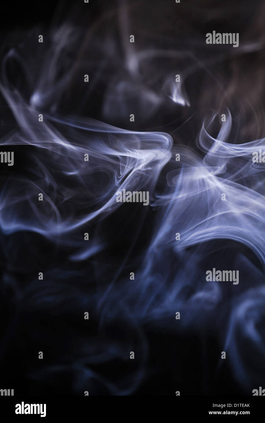 Blue smoke curl hi-res stock photography and images - Alamy