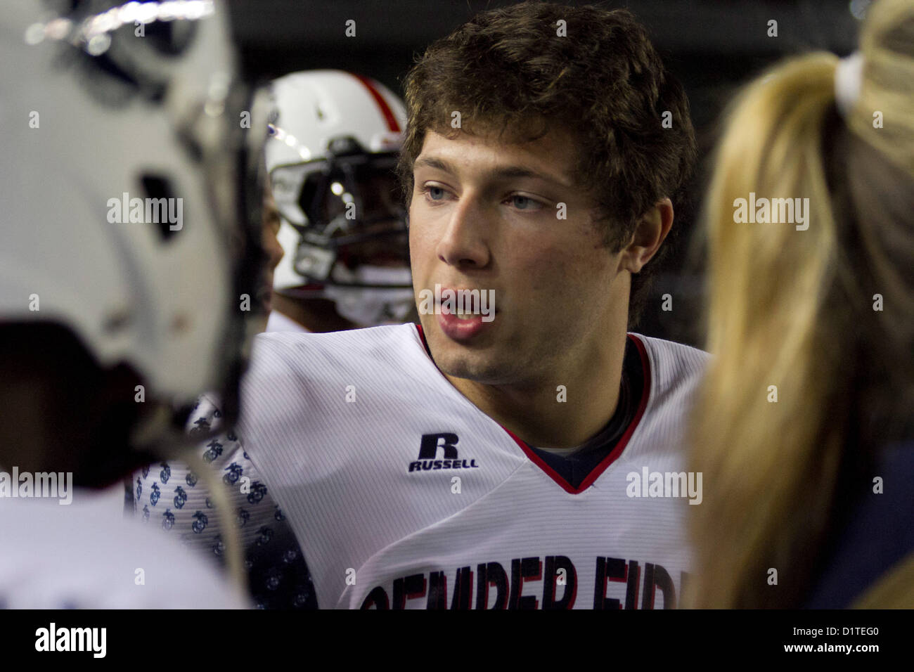 A member of the Semper Fidelis All-American Bowl Team West watches a play, Jan. 4, 2013, at the ...