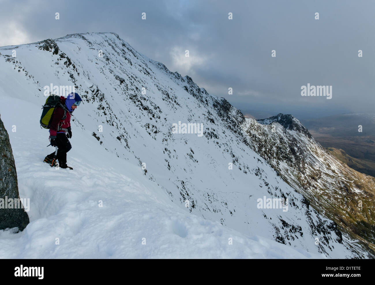 A hillwalker on Snowdon in winter conditions Stock Photo - Alamy