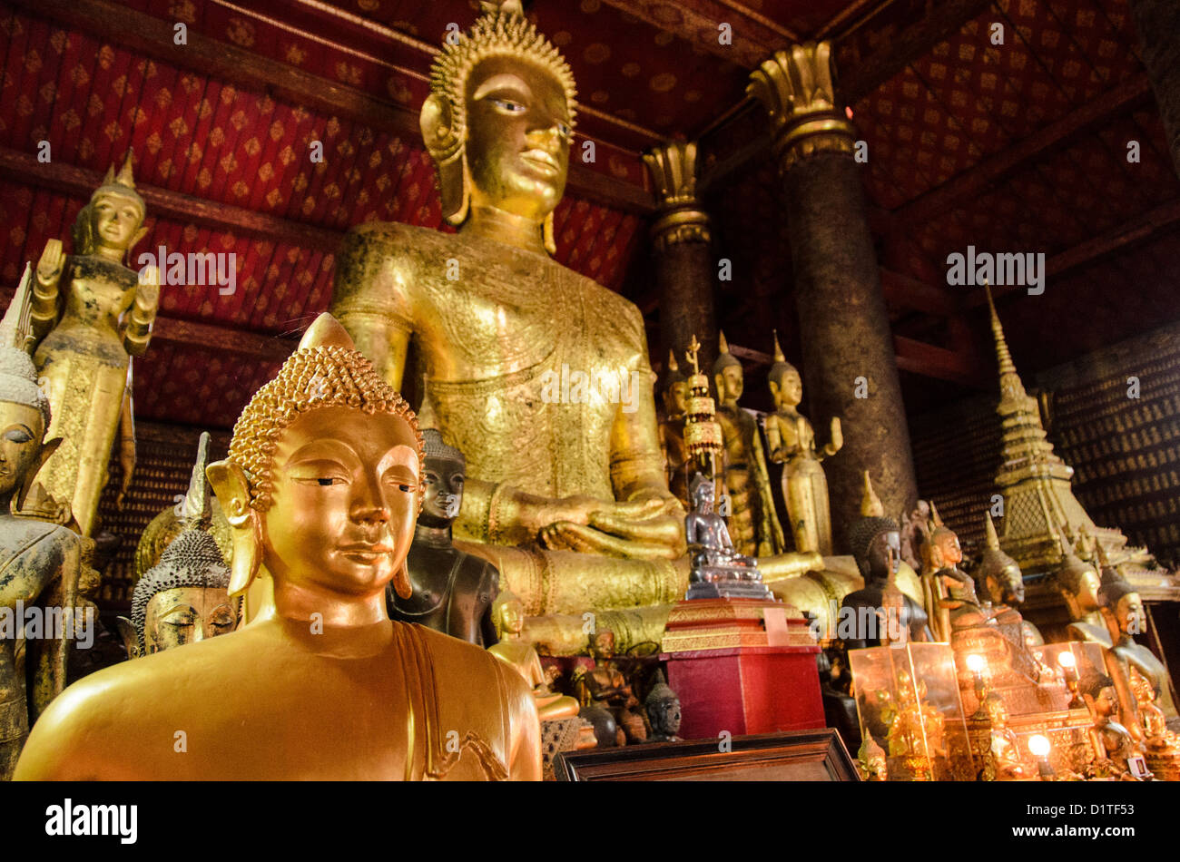 Wat Mai Altar Buddhist Art Luang Prabang Laos // LUANG PRABANG, Laos — The altar at Wat Mai ...