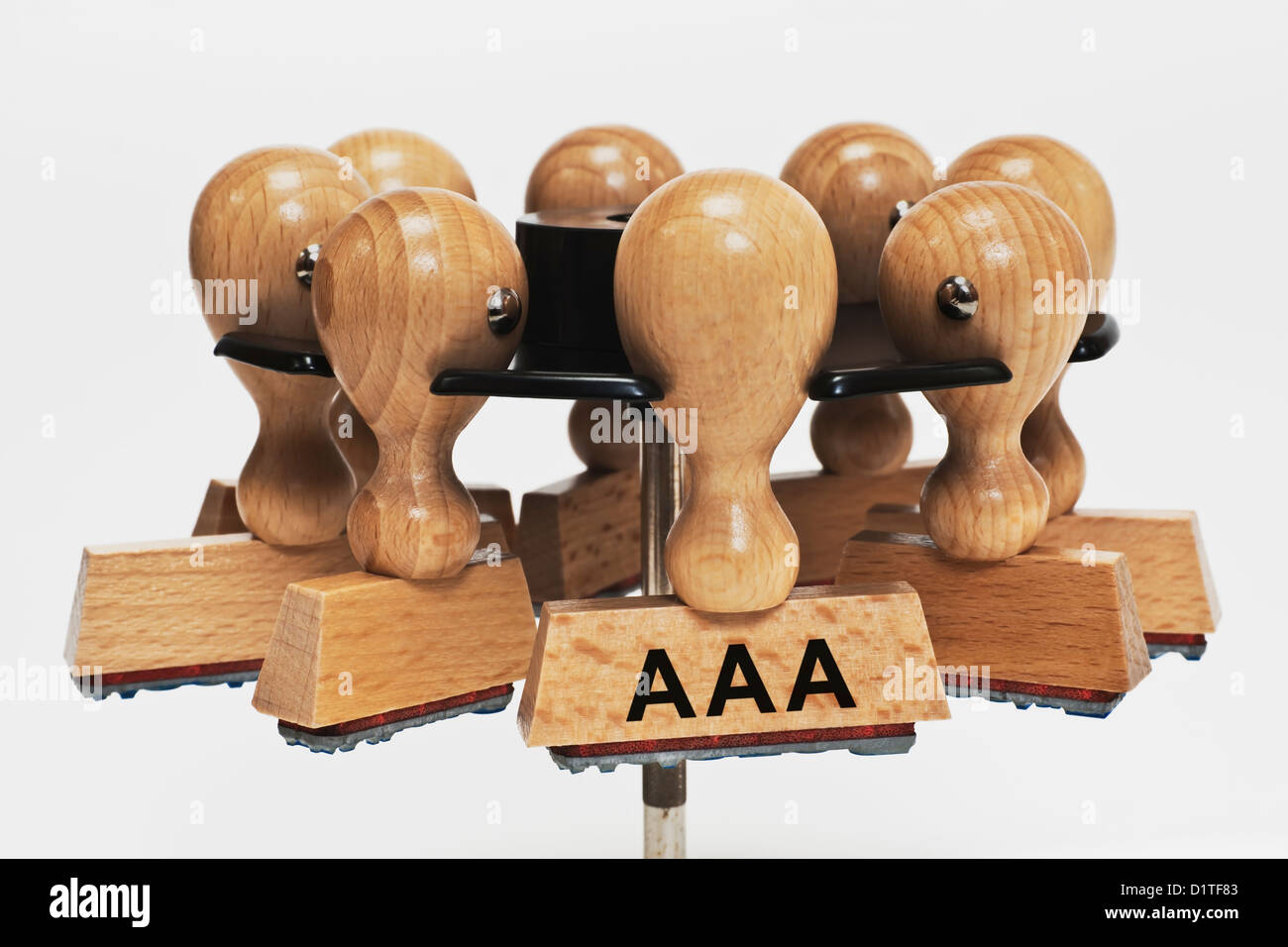 many stamps hanging in a stamp rack, one has the inscription AAA ...