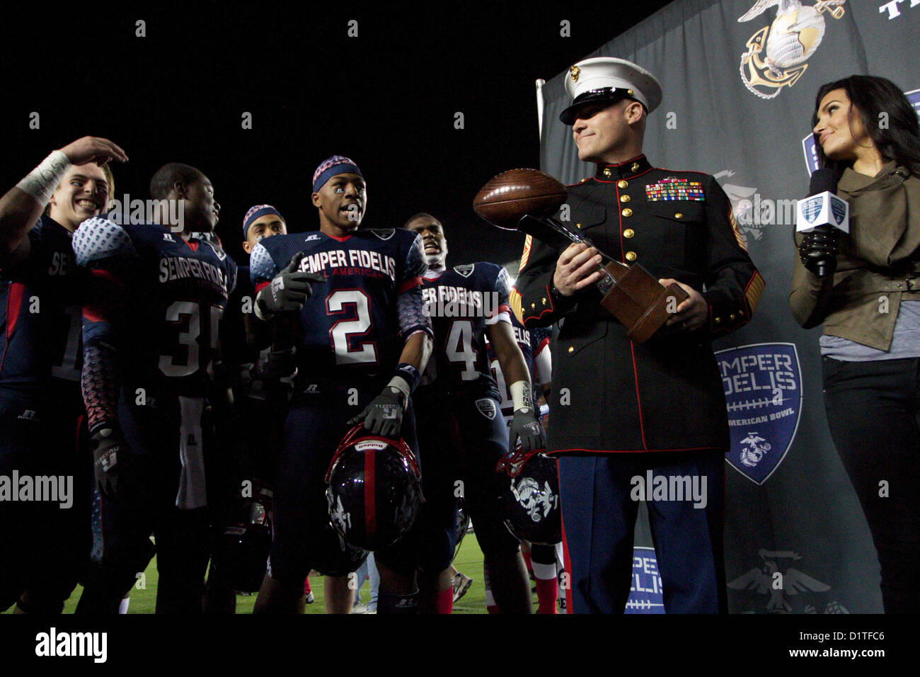Sgt. Maj. Micheal Barrett, Sergeant Major of the Marine Corps, presents ...