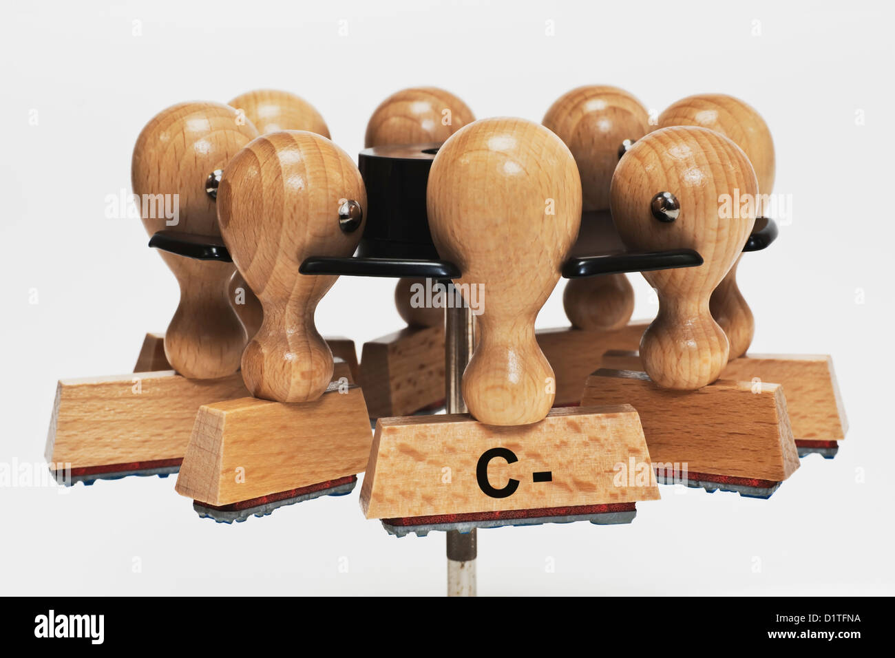 many stamps hanging in a stamp rack, one has the inscription C minus ...