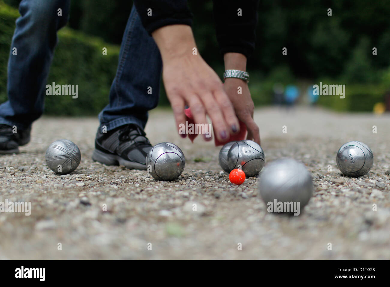 Schleswig, Germany, a game of pétanque, also called Boule, in the ...