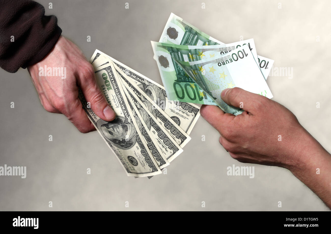 Two men exchange money. Giving money concept Stock Photo - Alamy