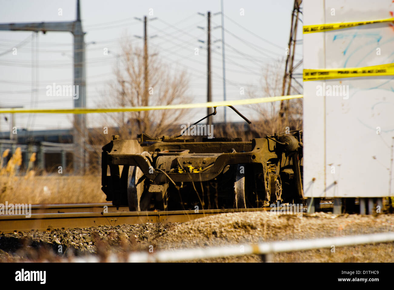 A set of wheeles belonging to the wrecked passenger train sit hundreds ...
