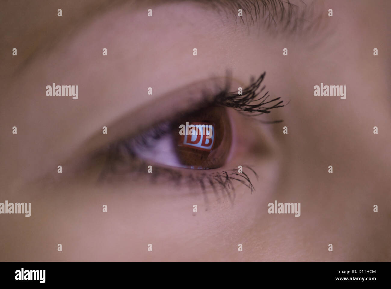 Berlin, Germany, mirroring the German Railways logo in the eye of a ...