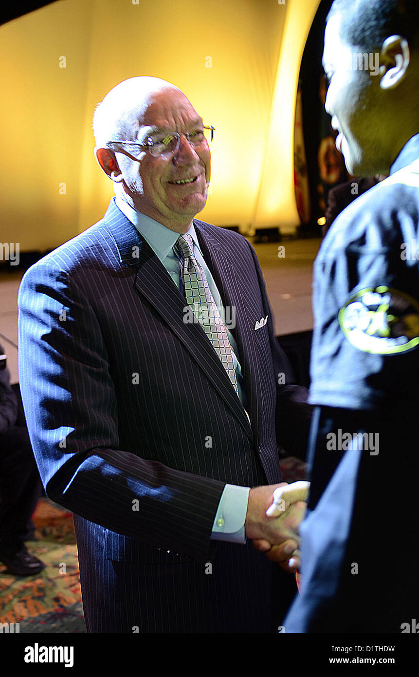 Thomas Lamont presents awards to U.S. Army All-American Bowl football players at the Marriott ...