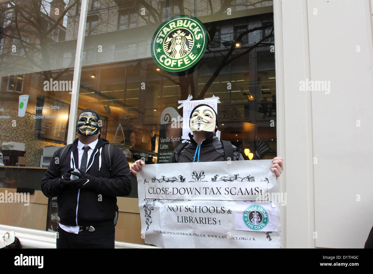 Campaigners from Anonymous and UK Uncut target outlets in Birmingham ...