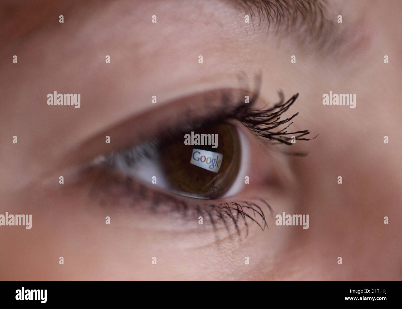 Berlin, Germany, mirroring the Google logo in the eye of a woman Stock ...