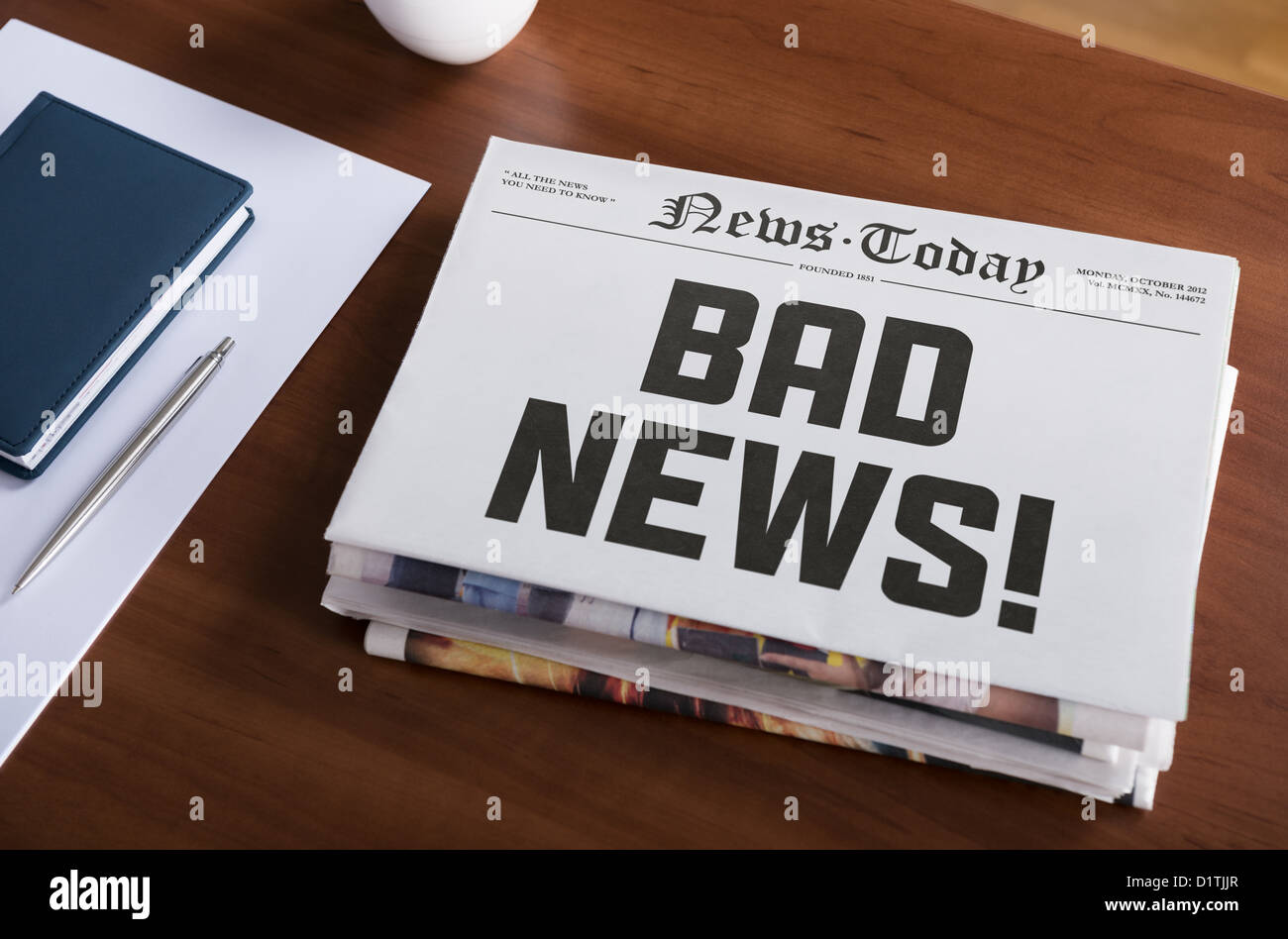 Newspaper concept with hot topic "Bad news" lying on office desk Stock ...