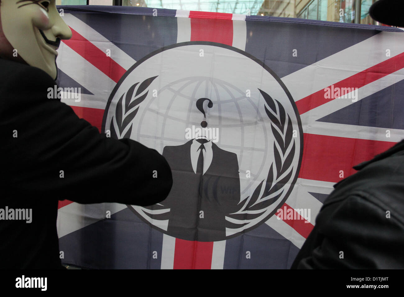 Campaigners from Anonymous and UK Uncut target outlets in Birmingham ...