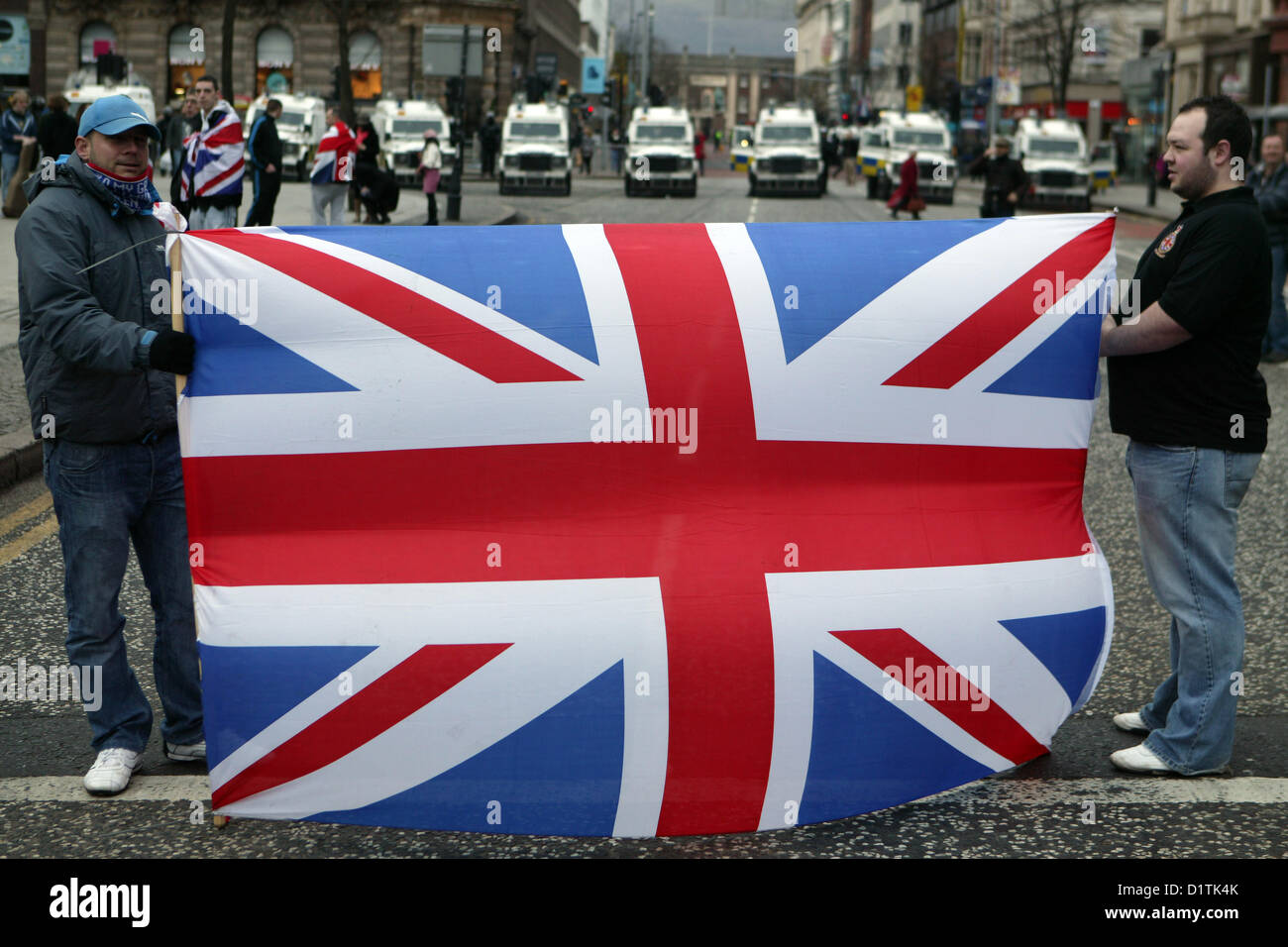 Belfast, UK. 5th Jan, 2013. PSNI officers in Riot gear follow Loyalist ...