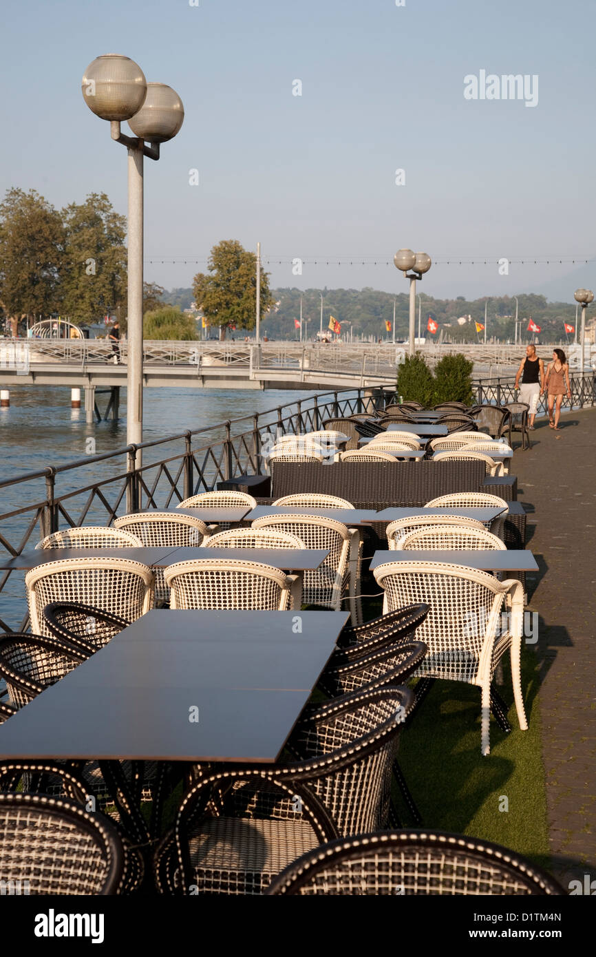 Cafe Tables by River Rhone and Bergues Bridge; Geneva; Switzerland ...