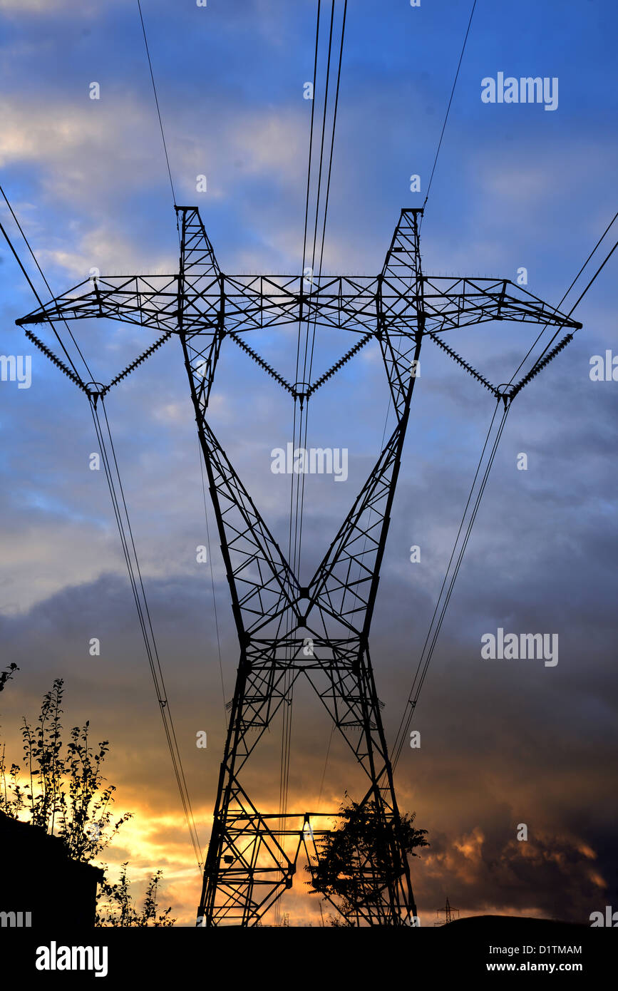 high-voltage power line at sunset Stock Photo - Alamy