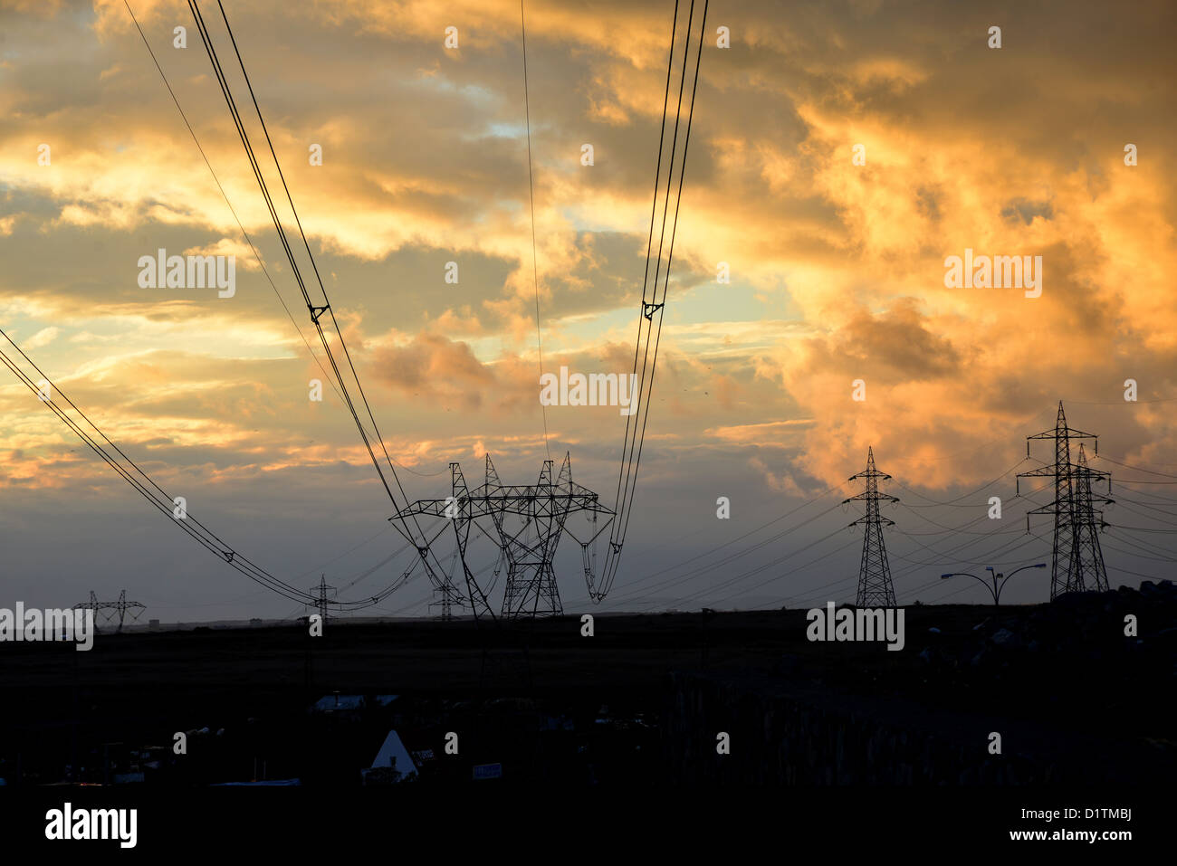 high-voltage power line at sunset Stock Photo - Alamy