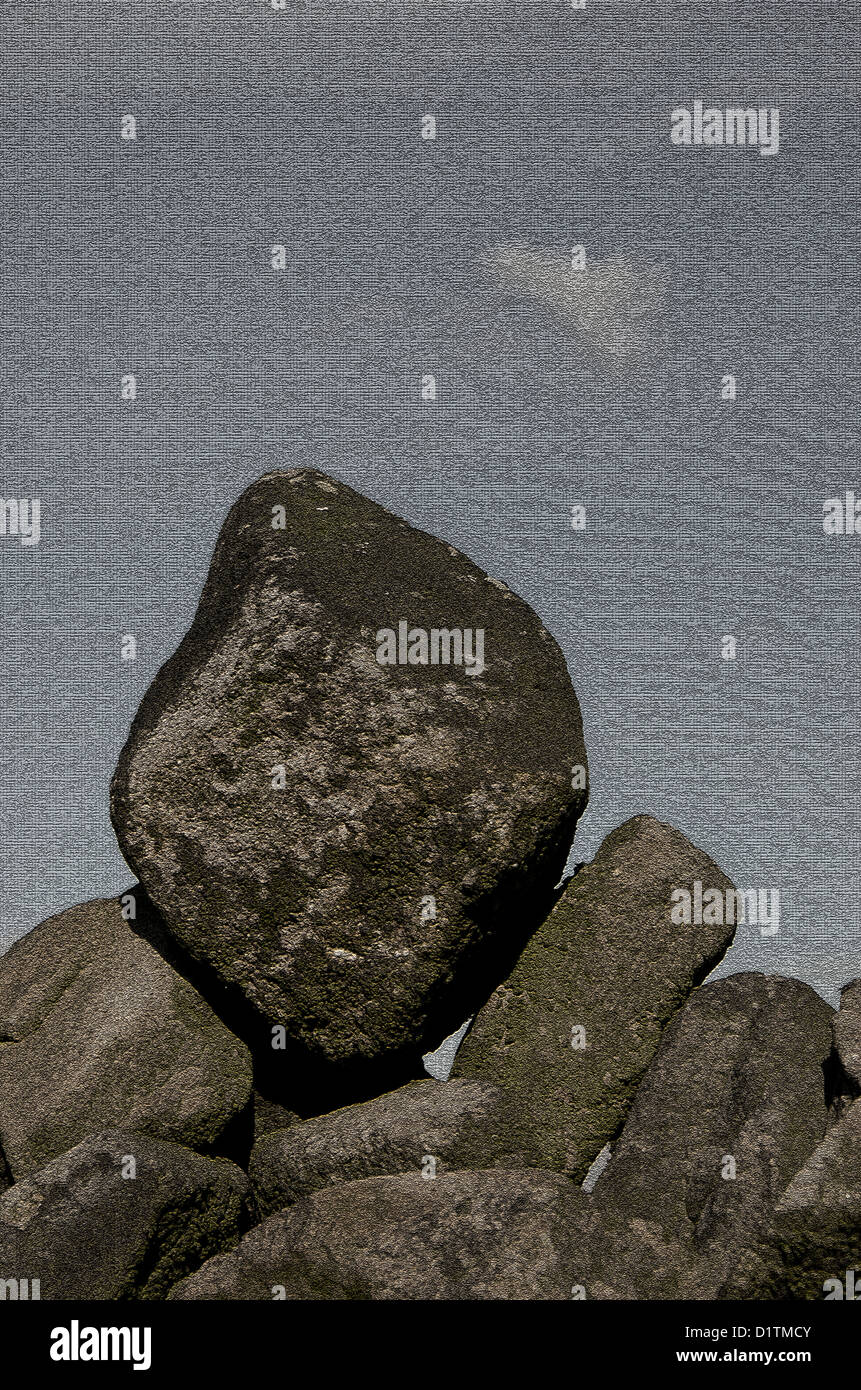 Old stone wall of solid rock with a cloud floating past Stock Photo - Alamy