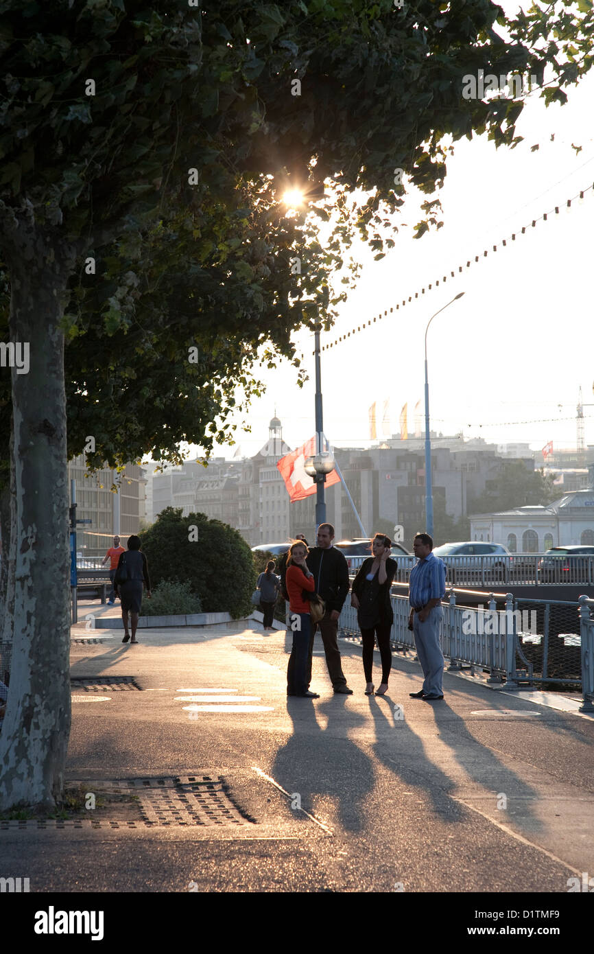 People walking alongside Lake Geneva, Geneva, Switzerland Stock Photo ...