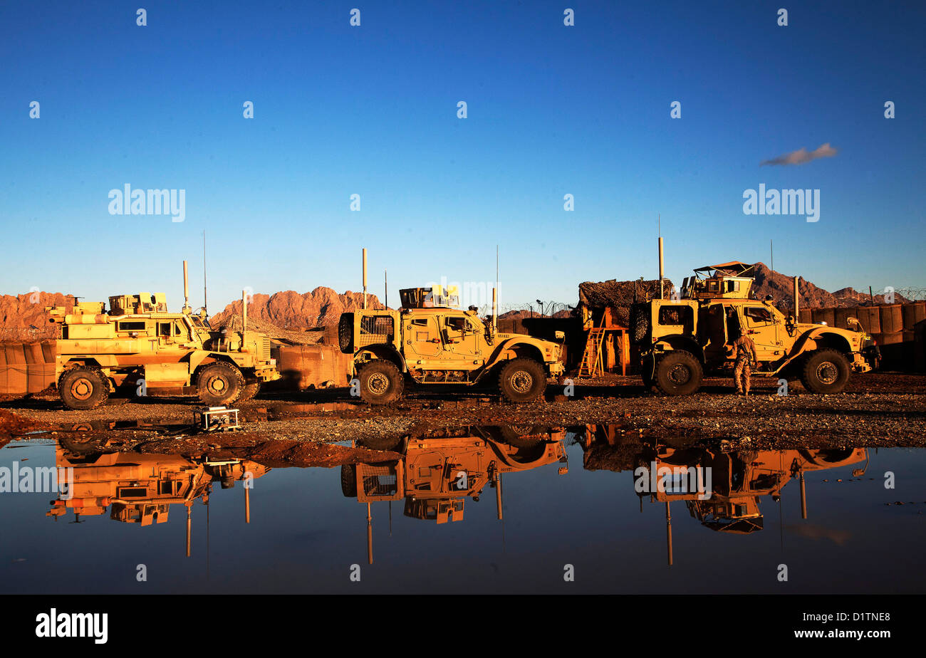 US Marine inspects his armored vehicle at Forward Operating Base Now ...