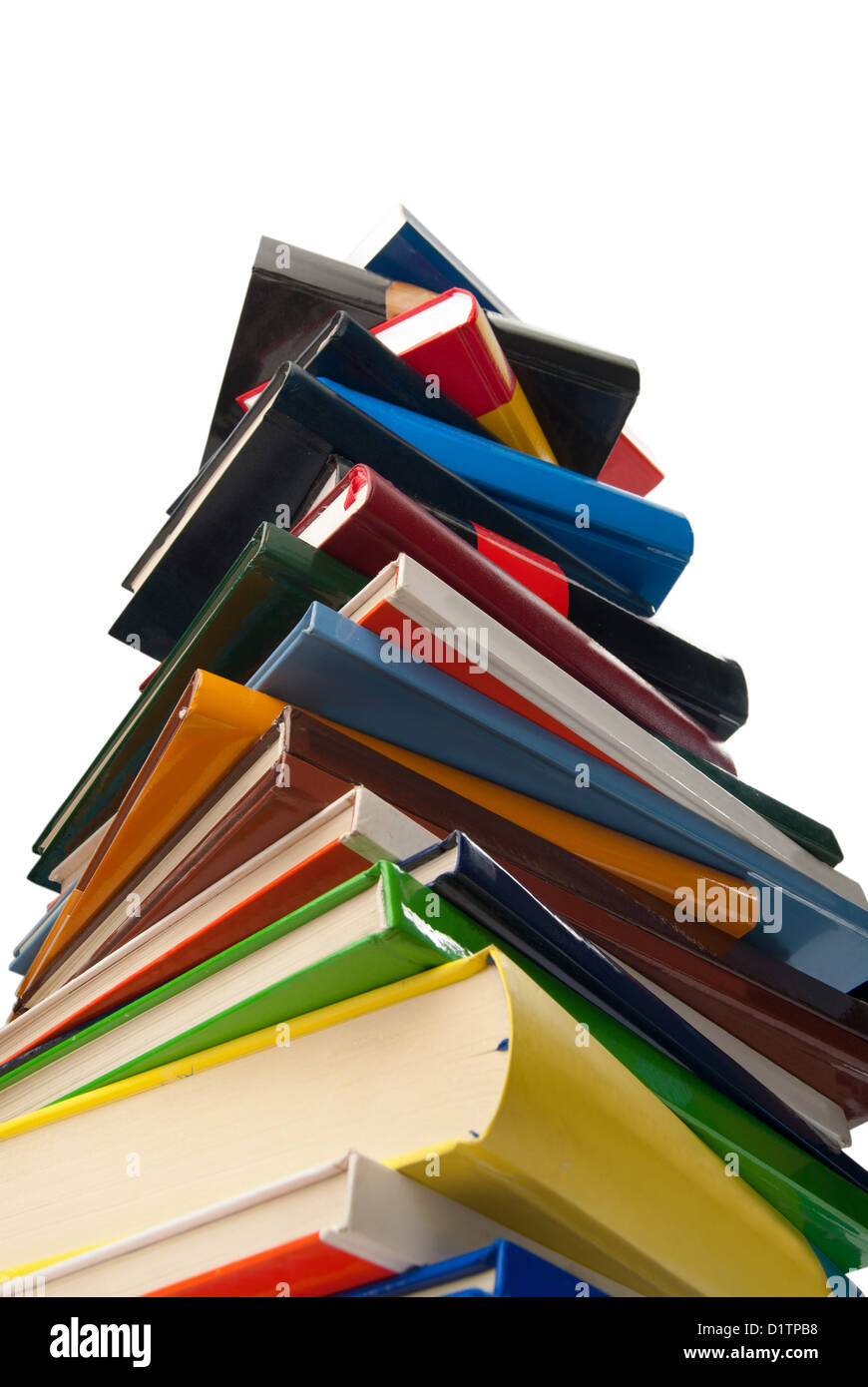 Books towering one over the other isolated on white with space for text ...