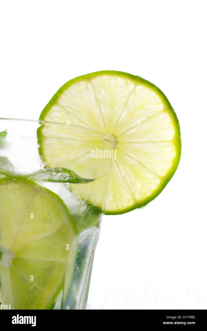 Green mojito with a slice of lime isolated on white Stock Photo - Alamy