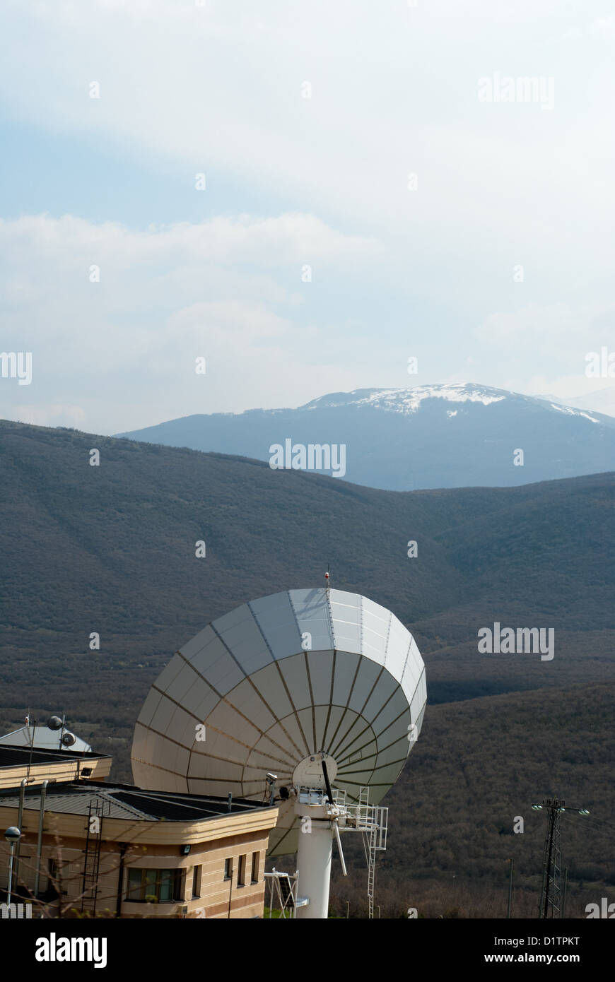 Beaming a signal in space to a satellite Stock Photo - Alamy