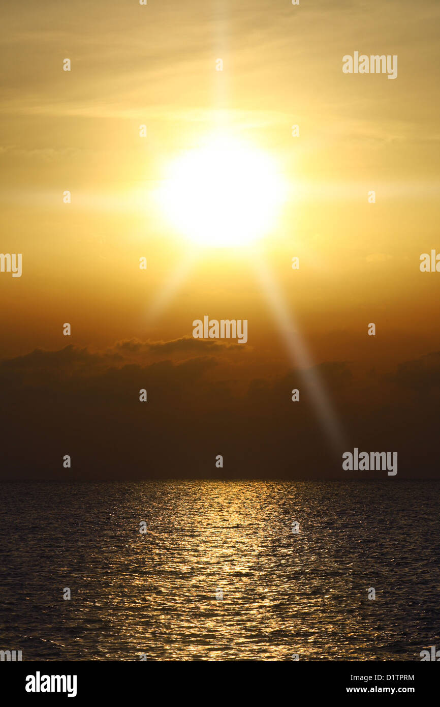 bright sunset over water Stock Photo - Alamy