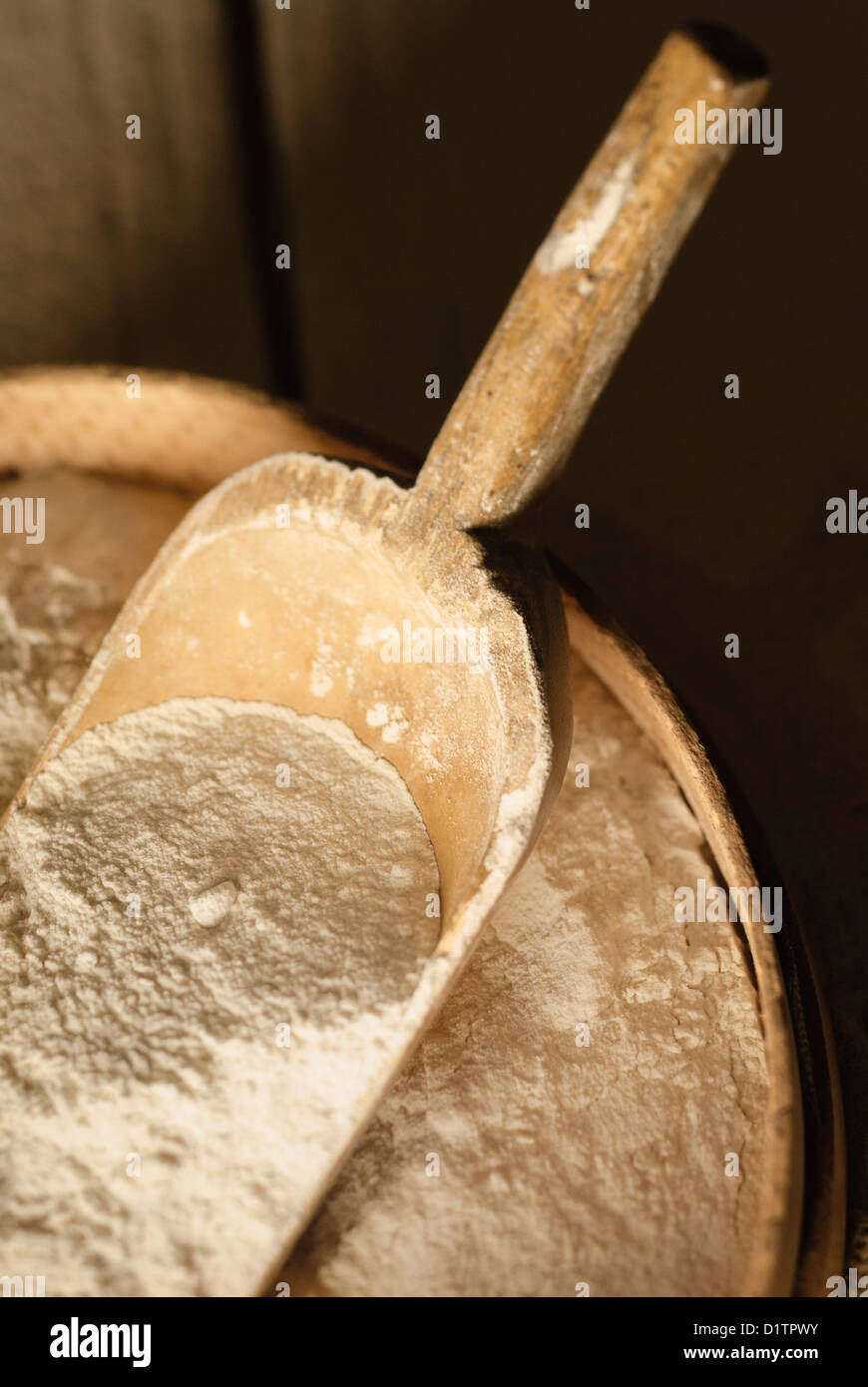 A bakery scoop with flour under morning sunlight Stock Photo - Alamy