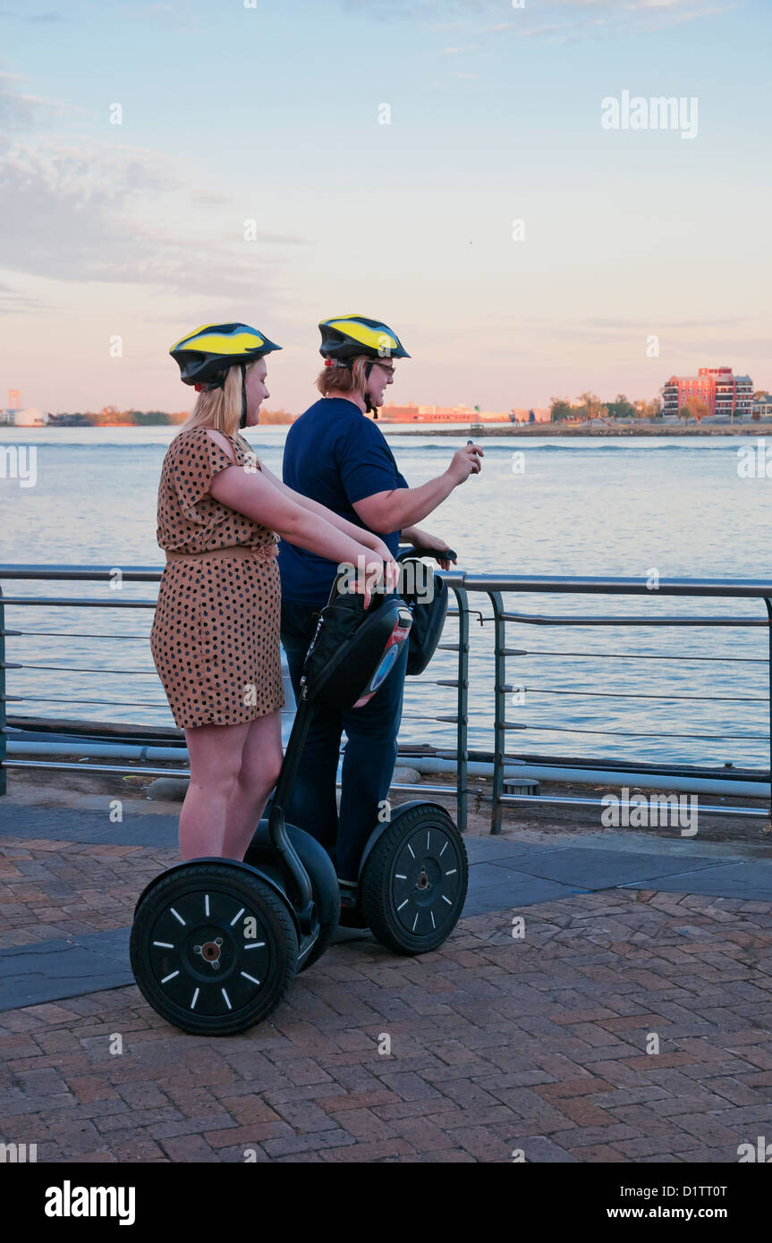 Two women ride the Segway on the Mississippi waterfront, New Orleans ...