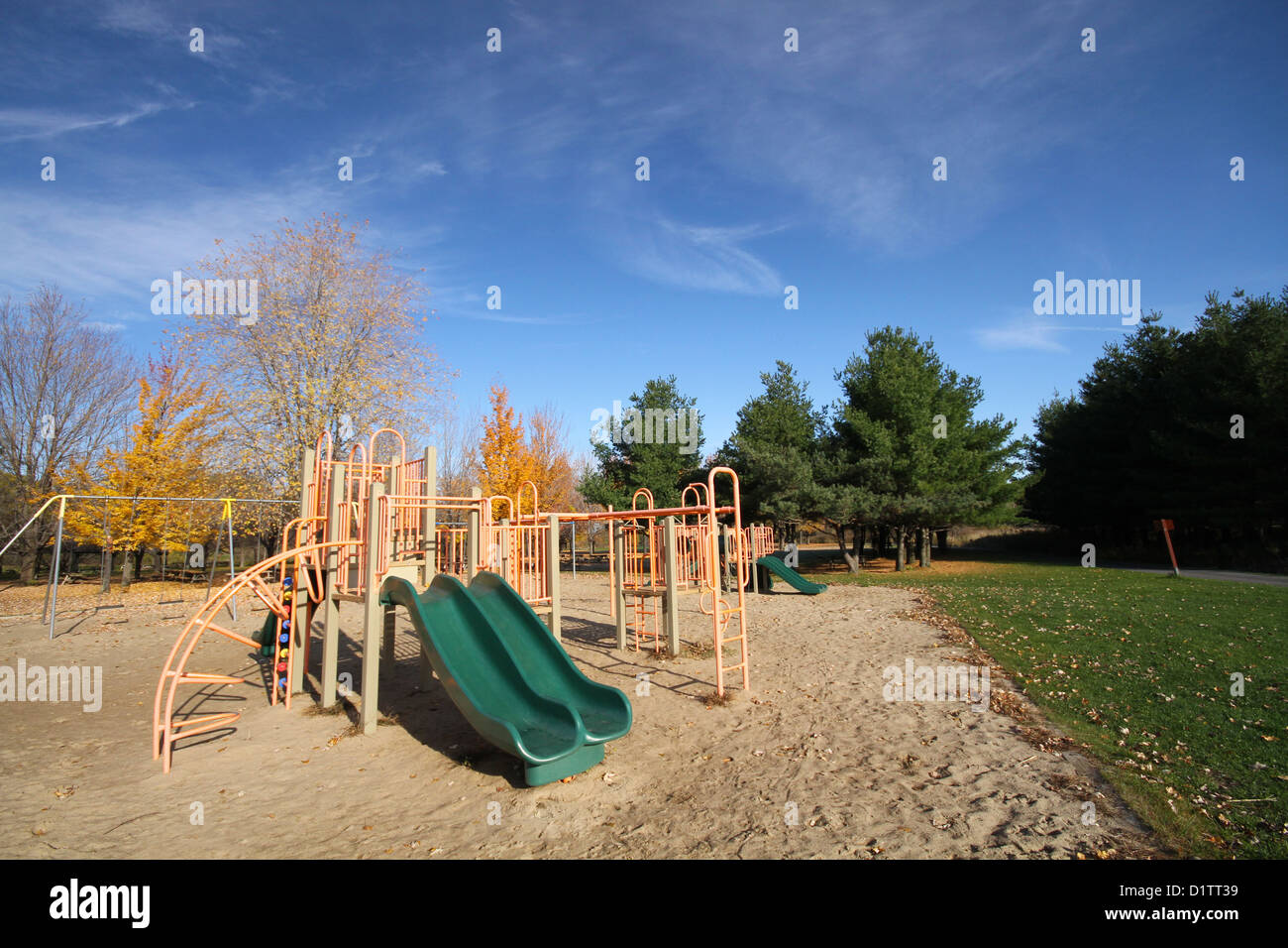 Playground in autumn Stock Photo - Alamy