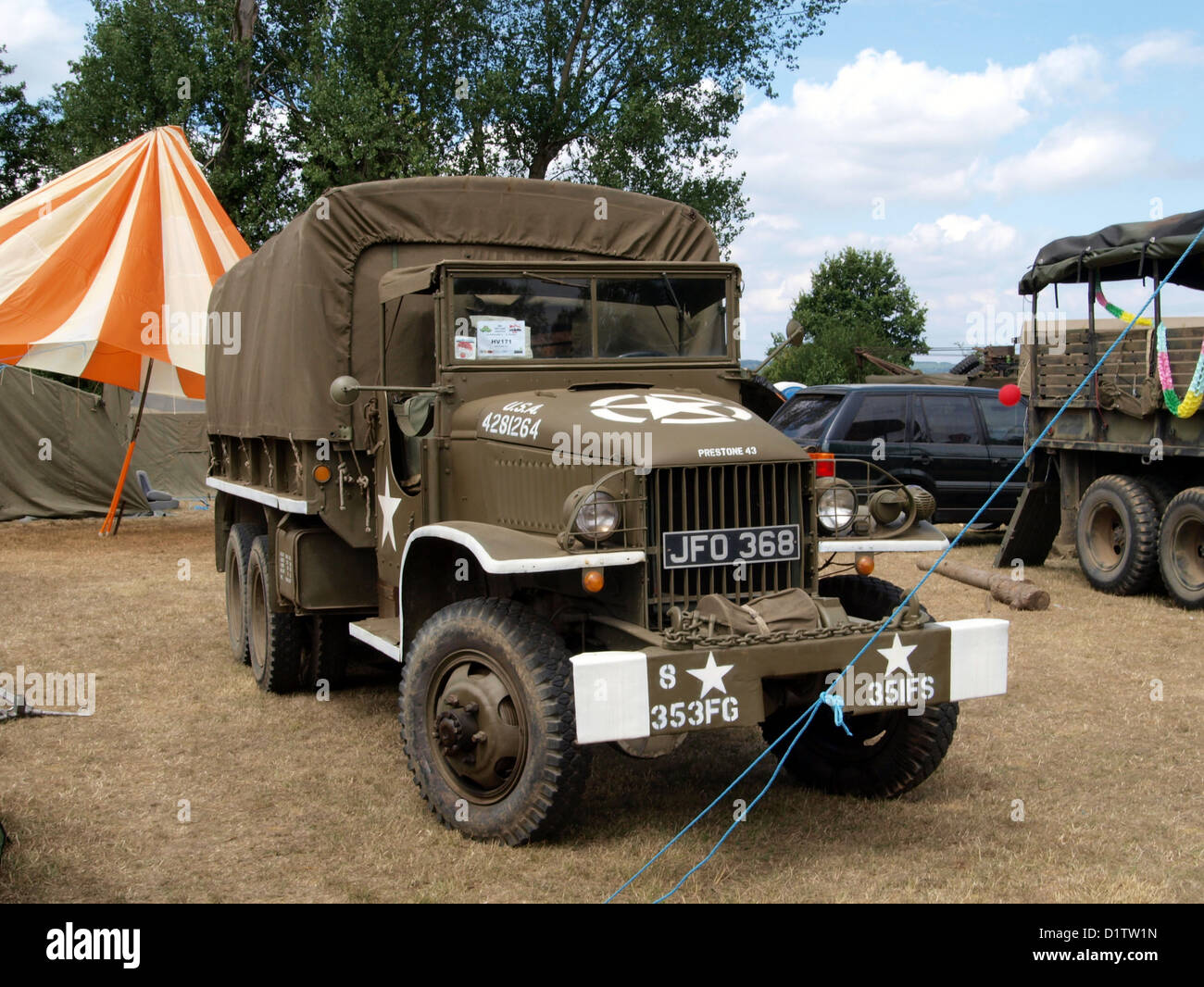 The GMC CCKW-353 is a 2.5-ton, 6x6 military cargo truck equipped with a ...