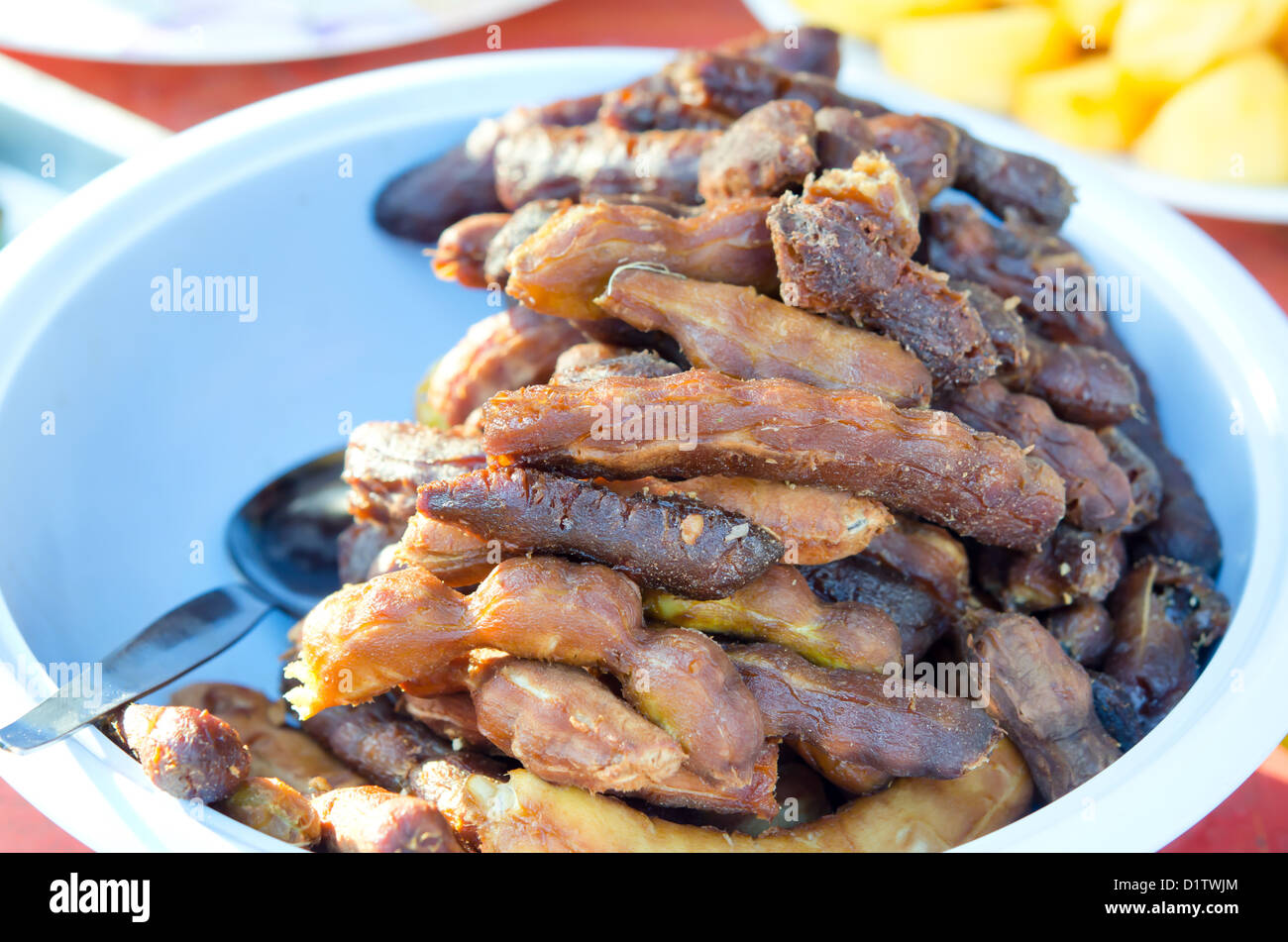Fresh brown tamarind fruit in bowl Stock Photo - Alamy