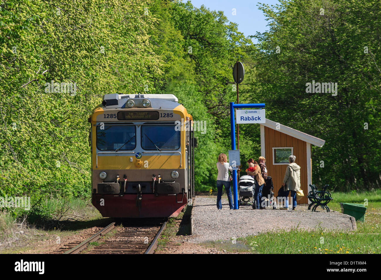 Passengers get off the train at the station Stock Photo - Alamy