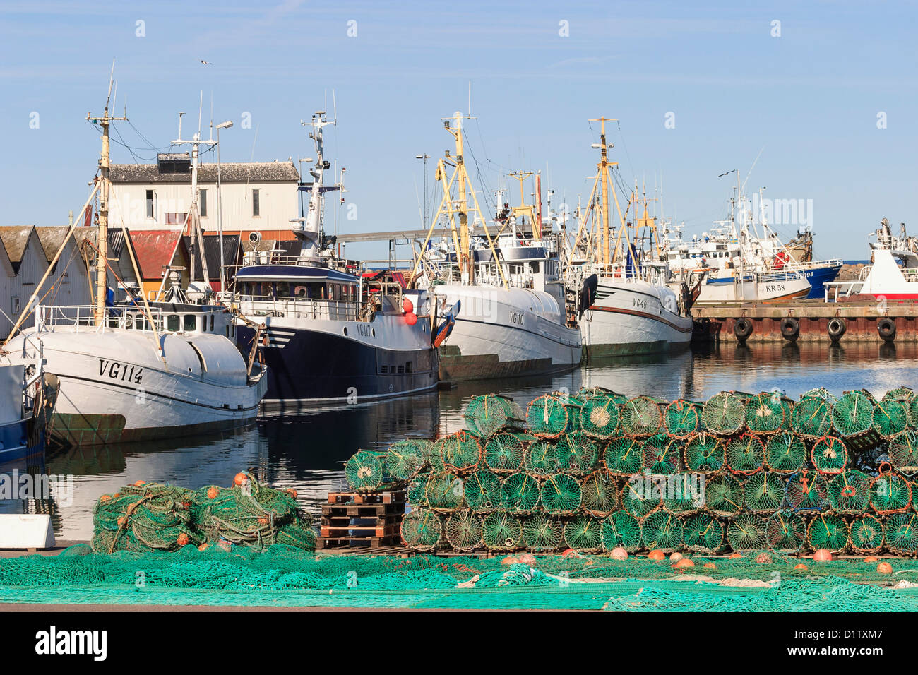 Fishing fleet in a harbour Stock Photo - Alamy