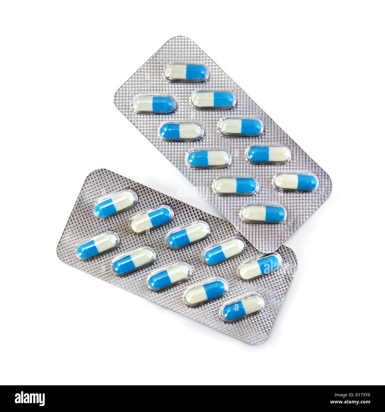 Blue capsules in two packs isolated on white background Stock Photo - Alamy