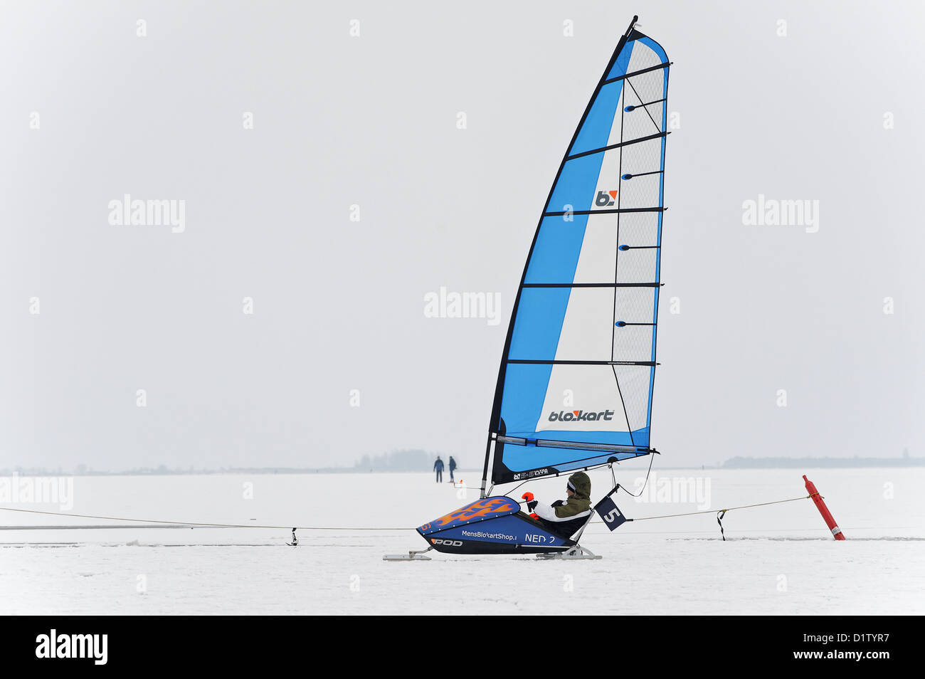 Wind Surfing on ice on a frozen lake in the Netherlands Stock Photo - Alamy