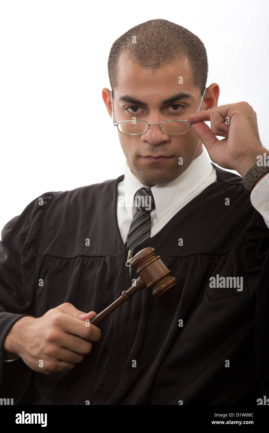 Young african american judge holding gavel Stock Photo - Alamy