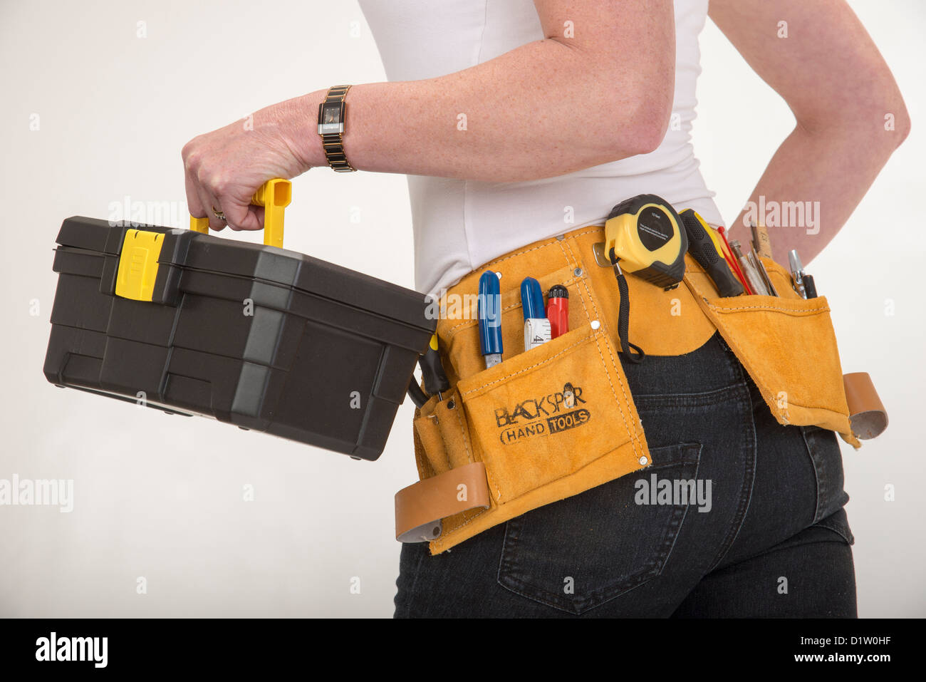 Woman wearing tool belt tools hi-res stock photography and images - Alamy