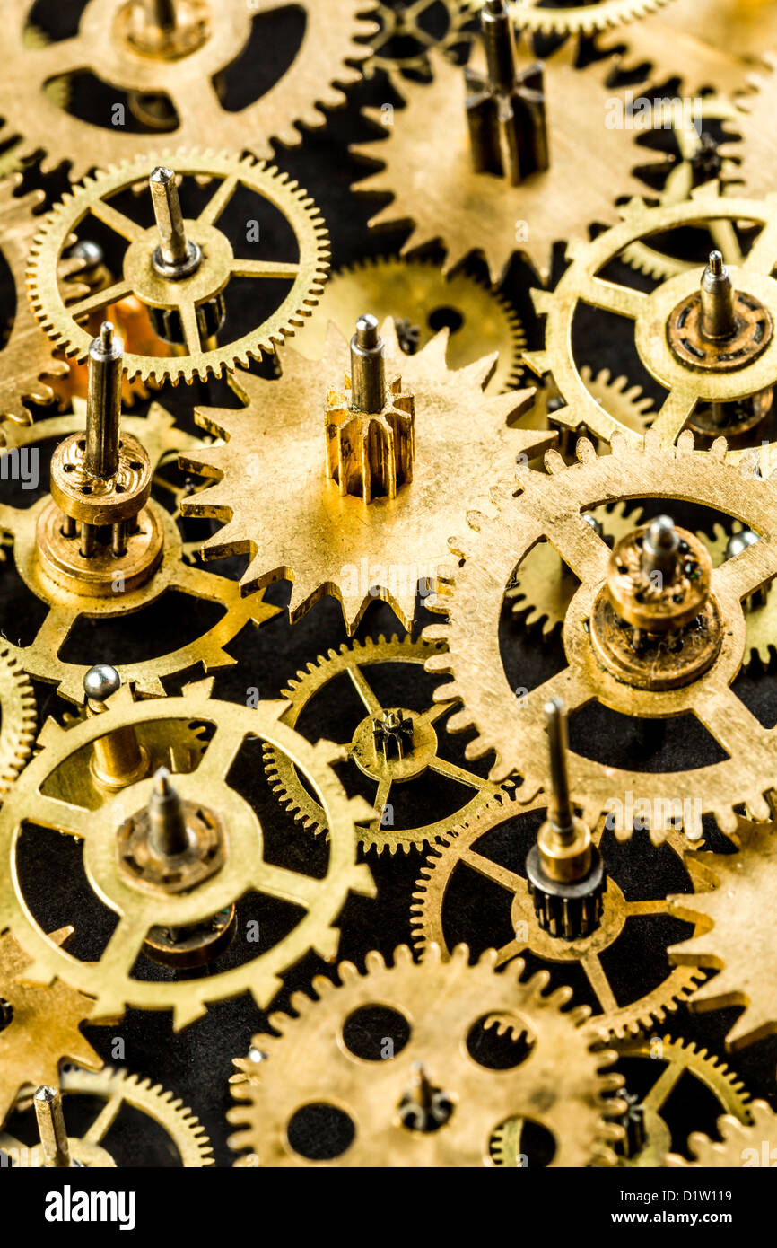 close up old mechanism on a black background Stock Photo - Alamy