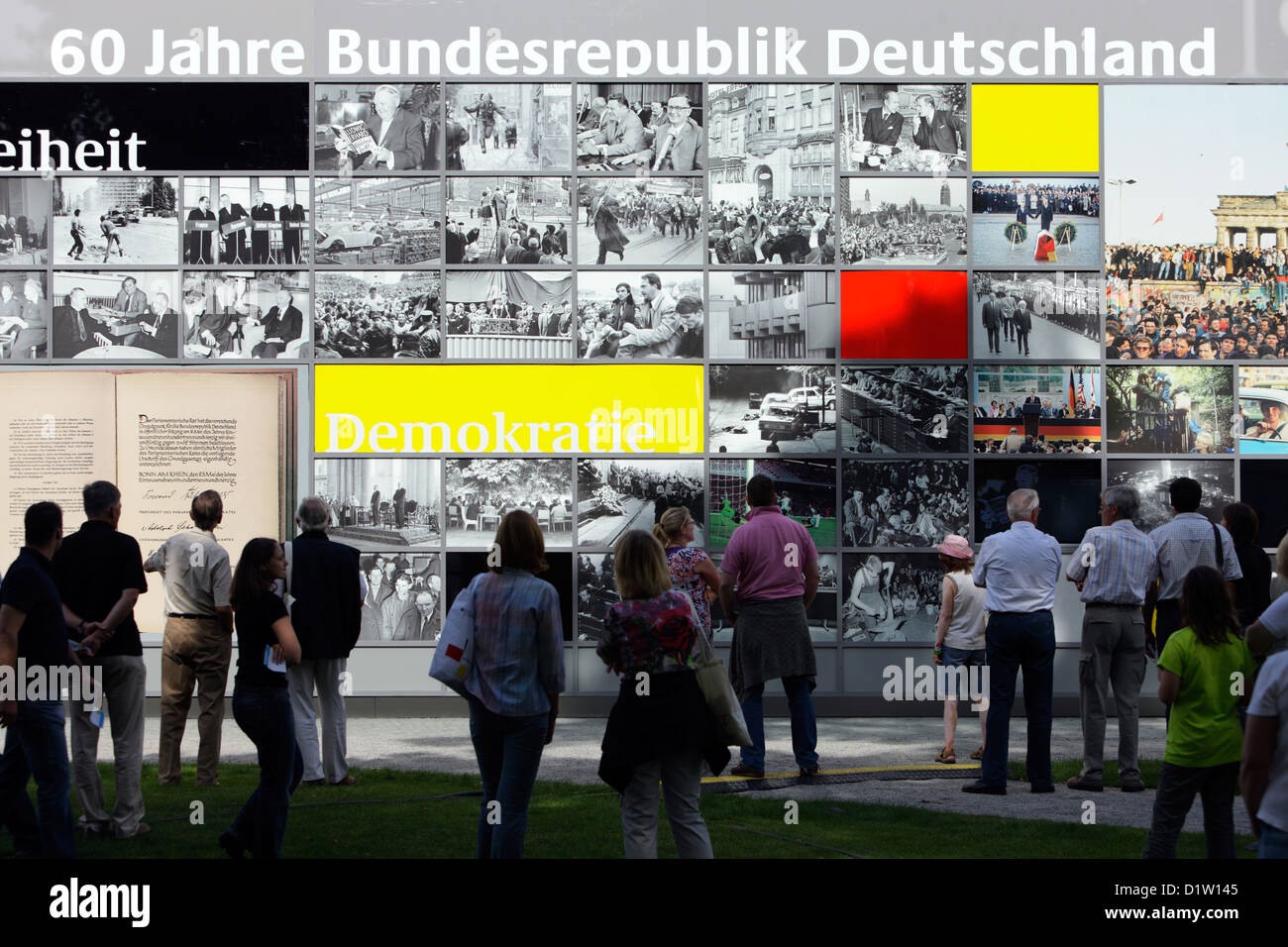 Berlin, Germany, visitors in front of a photo wall 60 years of the ...