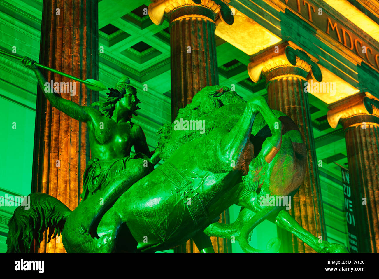 Berlin, Germany, the statue Kaempfende Amazone front of the illuminated ...
