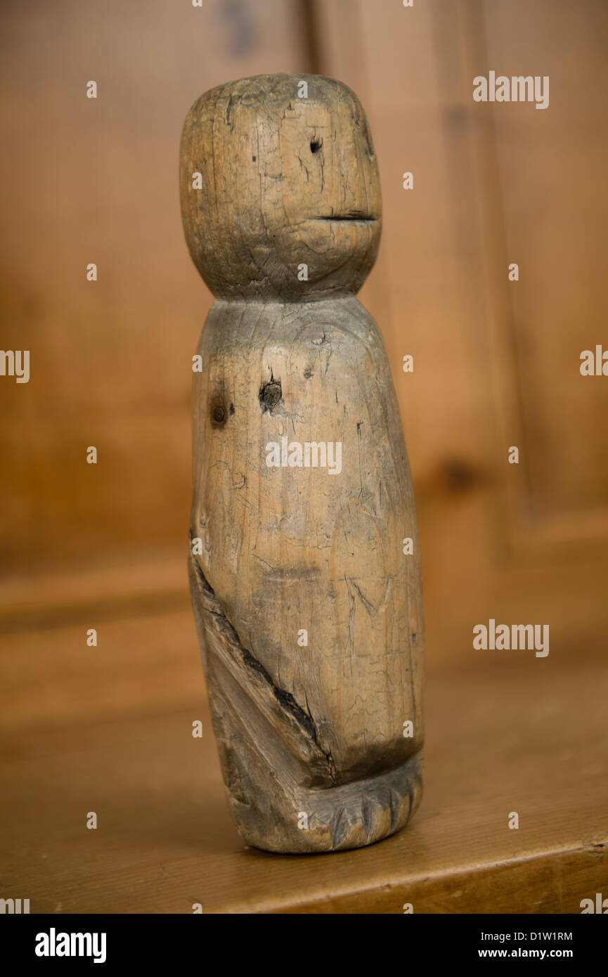 A small primitive carved wooden toy figure at the West Wales Museum of ...