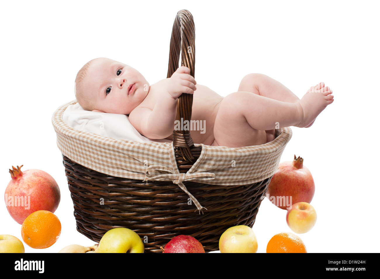 baby girl in a basket with toy bear isolated on white background The ...
