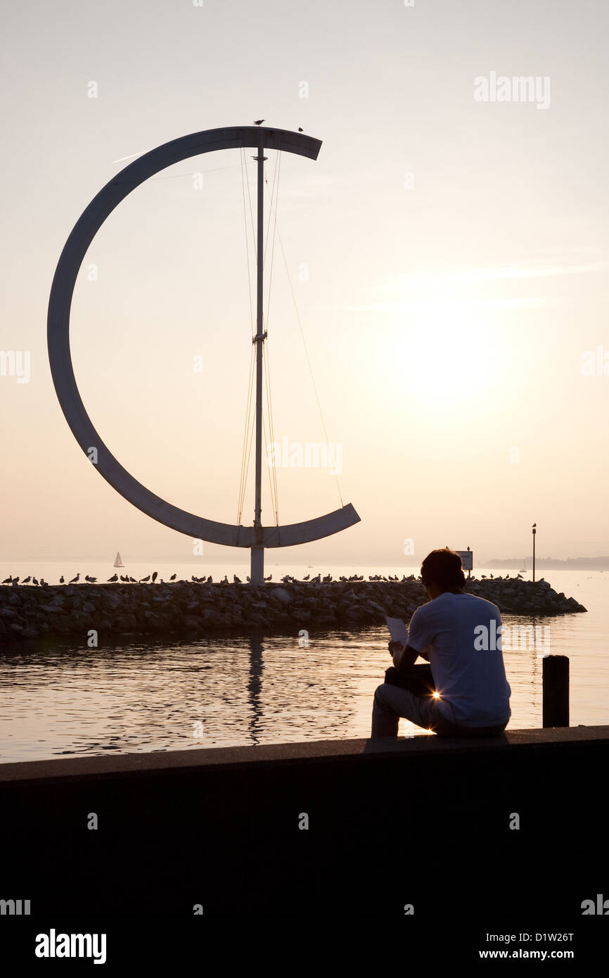 Young Man Reading Book by Girouette in Ouchy, Lake Geneva, Lausanne ...